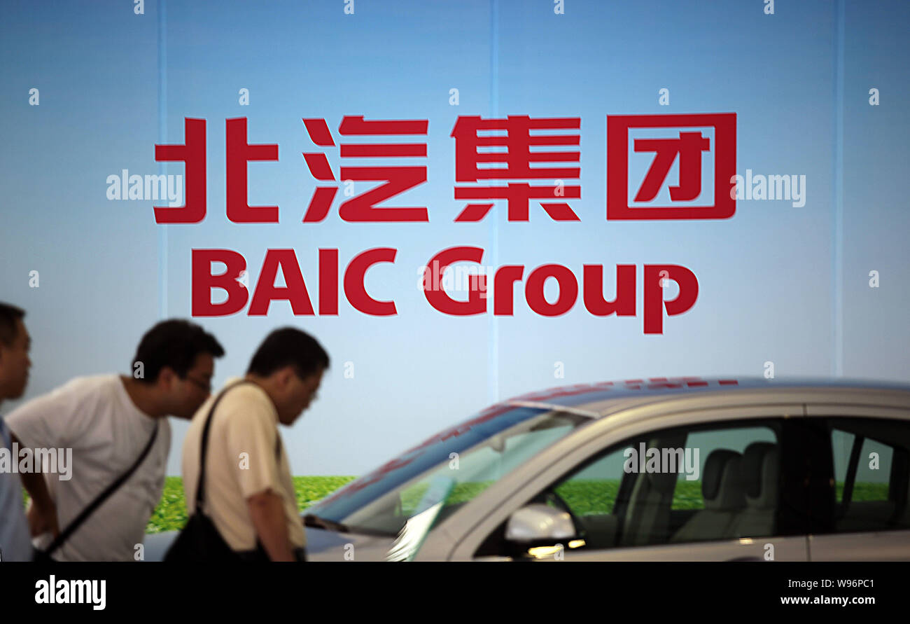--File--Chinese visitors look at a car of BAIC Group during an ...