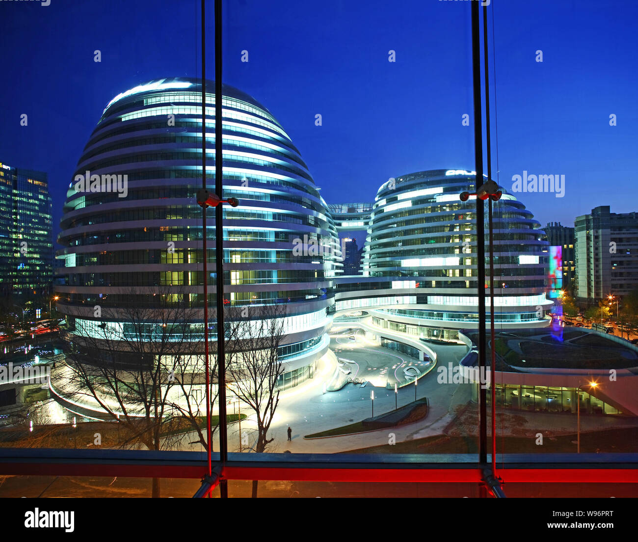 Night view of the Galaxy SOHO developed by SOHO China in Beijing, China ...