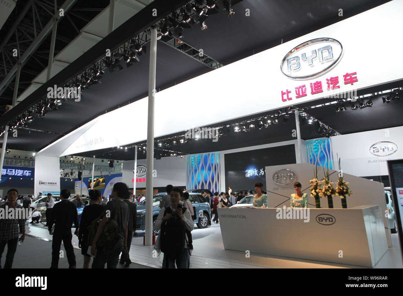 --FILE--People visit the stand of BYD car at 2012 Auto Show in ...