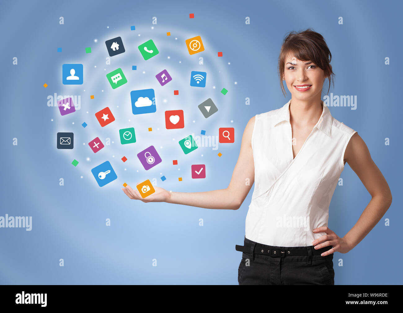 Young person presenting new application icons and symbols Stock Photo ...