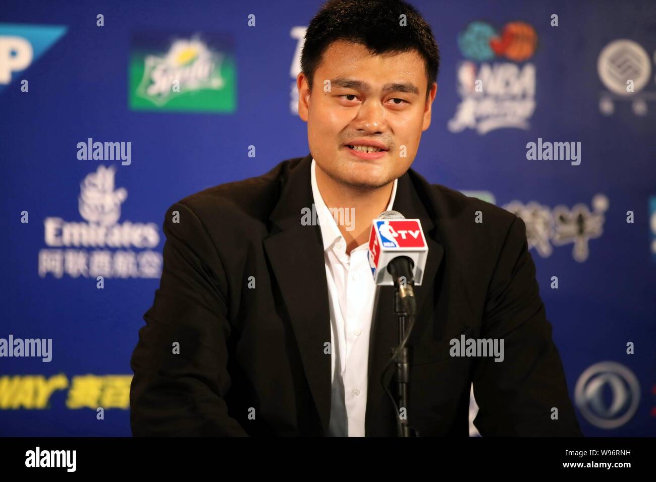 Retired Chinese basketball superstar Yao Ming speaks at a press ...