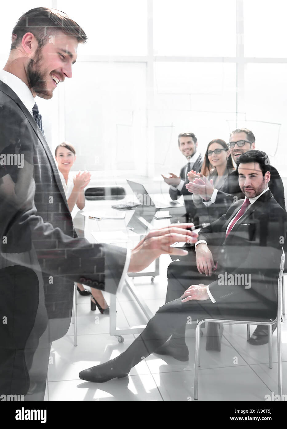 Working business people behind glass walls Stock Photo - Alamy