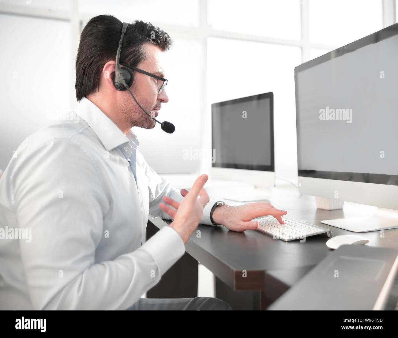 Man sitting in data centre hi-res stock photography and images - Alamy