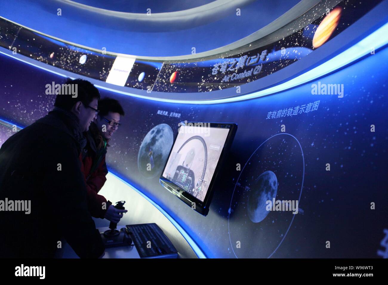 Visitors experience a new innovation item during Zhangjiang Innoparks ...