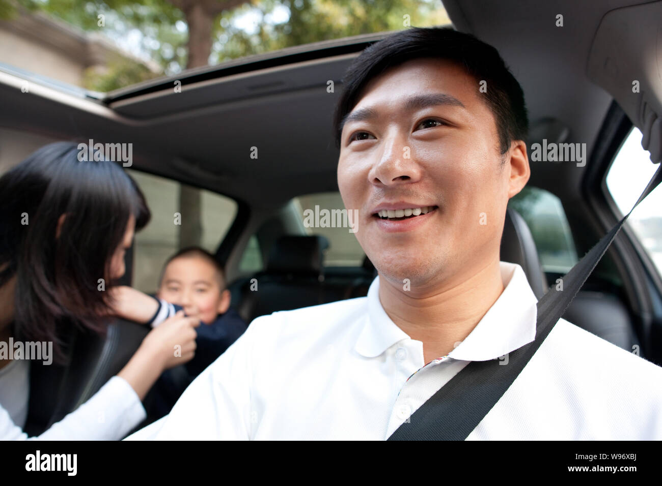 Creative photo: China, Chinese, man, woman, car, sedan, driving, family ...