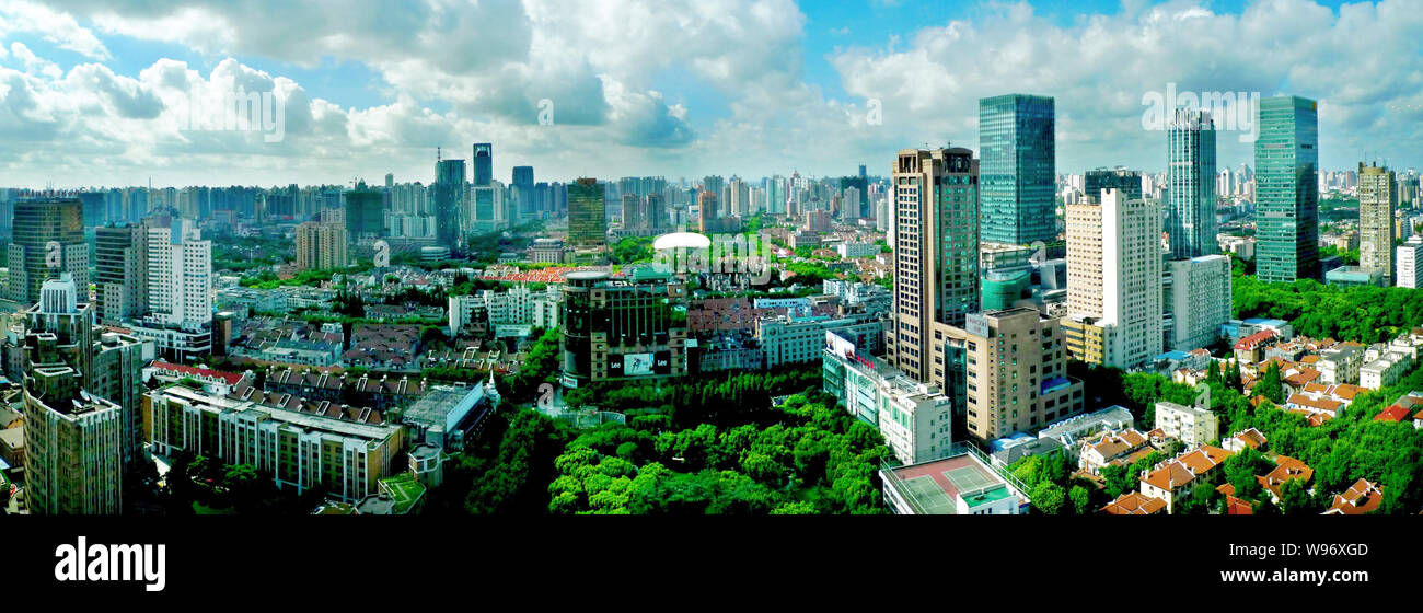 Skyline of Puxi with old houses and modern high-rise buildings in ...