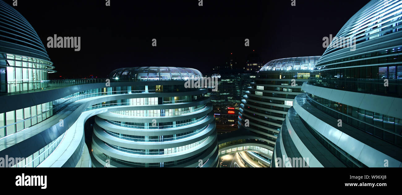 Night view of the Galaxy SOHO developed by SOHO China in Beijing, China ...