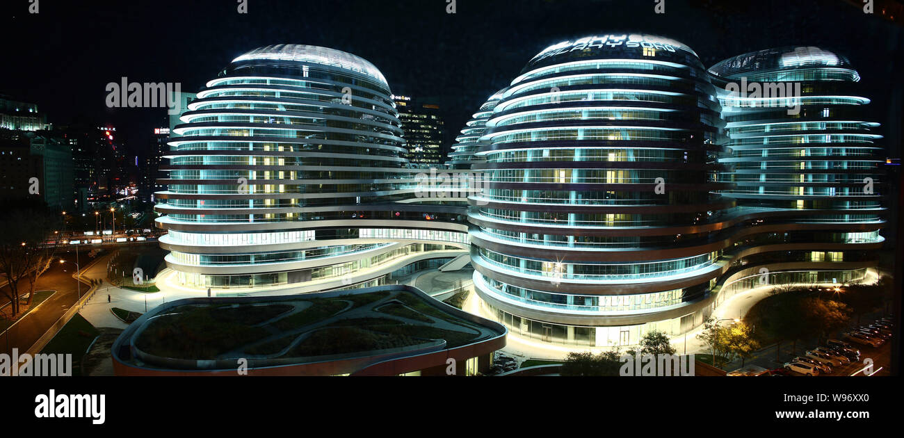Night view of the Galaxy SOHO developed by SOHO China in Beijing, China ...