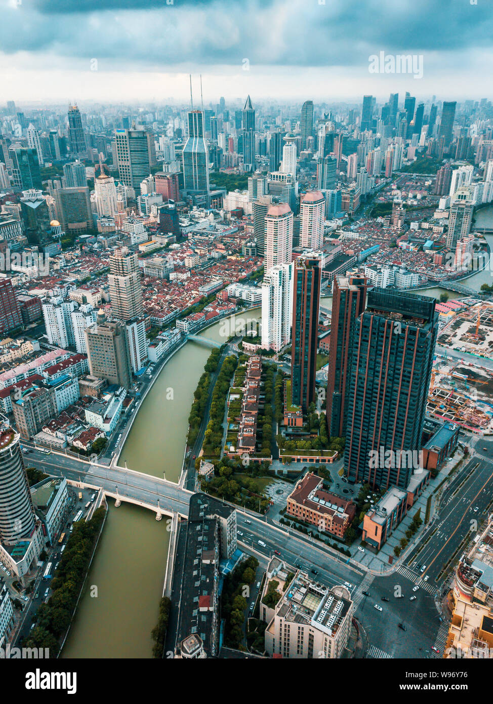 Aerial view of Shangai skyscrapers rising high in Chinese mega city ...