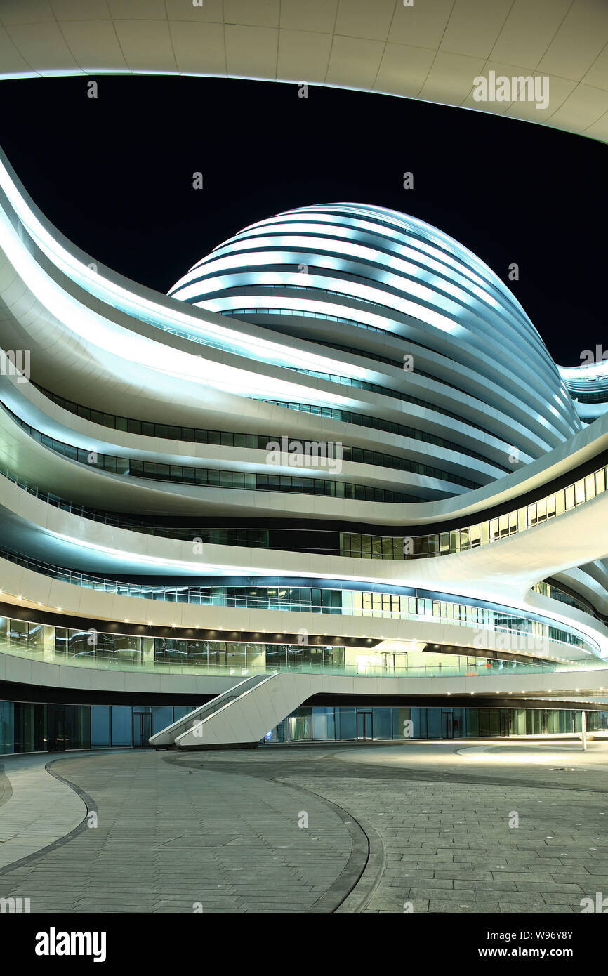Night view of the Galaxy SOHO developed by SOHO China in Beijing, China ...