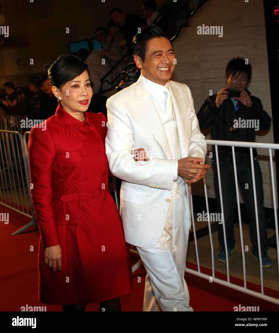 Hong Kong Actor Chow Yun Fat Right And His Wife Jasmine Tan Arrive For The Premiere Of The
