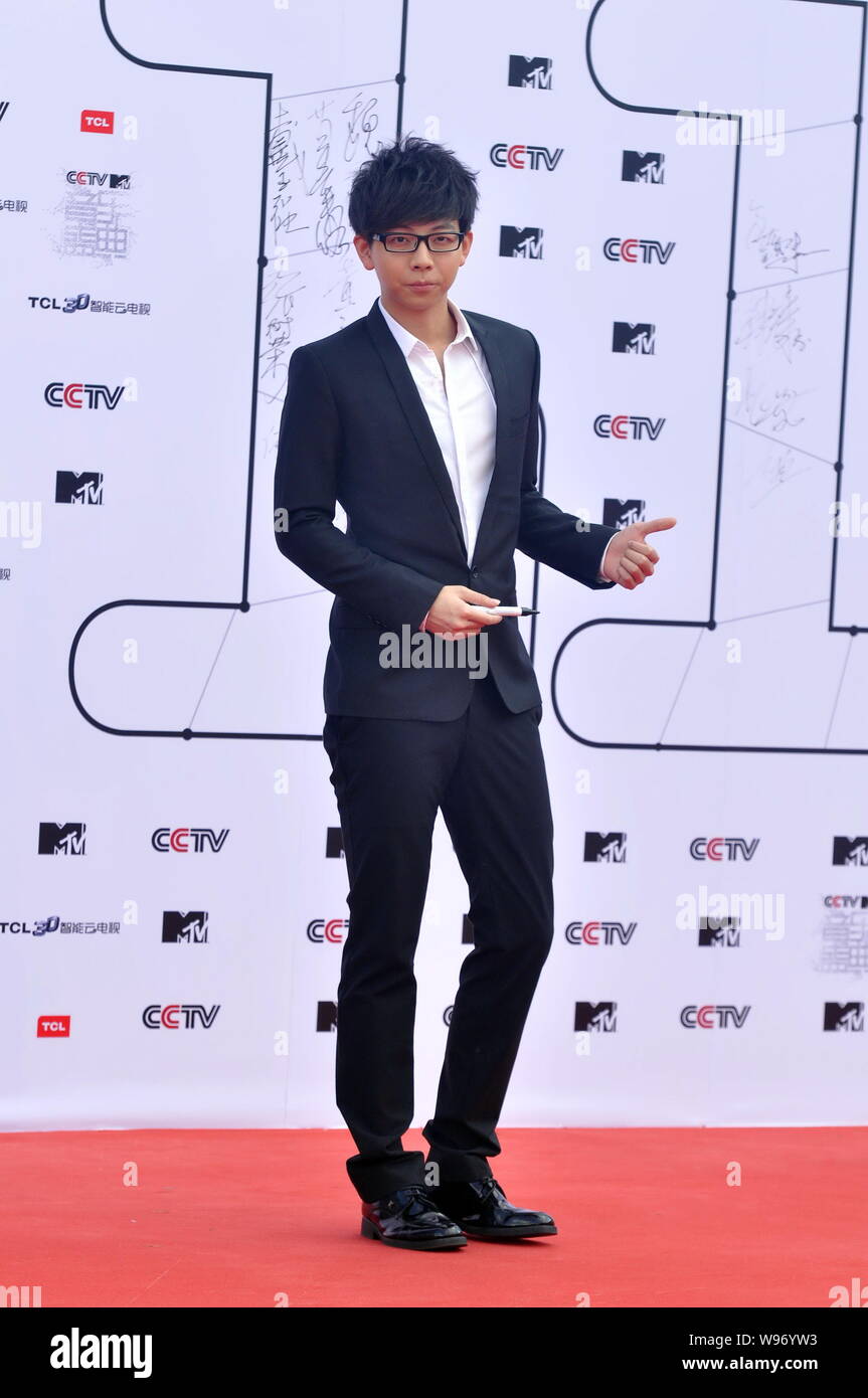 Chinese singer Hu Xia poses on the stage as he arrives for the 11th ...