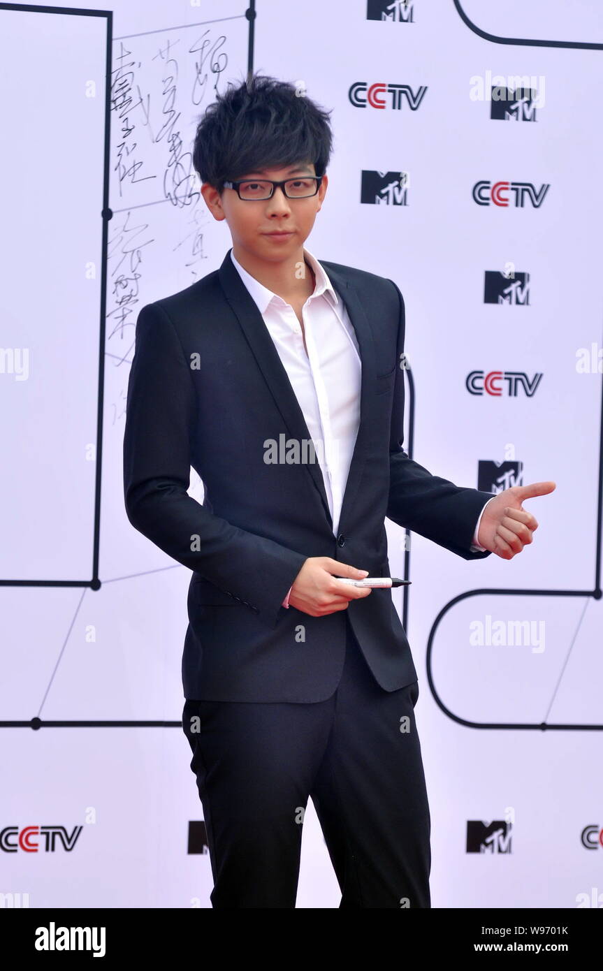 Chinese singer Hu Xia poses on the stage as he arrives for the 11th ...