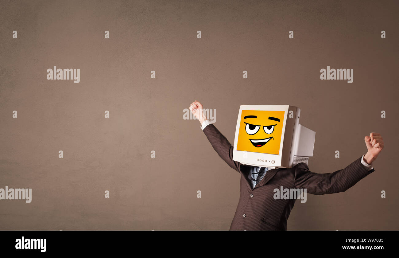 Young person with happy smiley monitor head Stock Photo - Alamy
