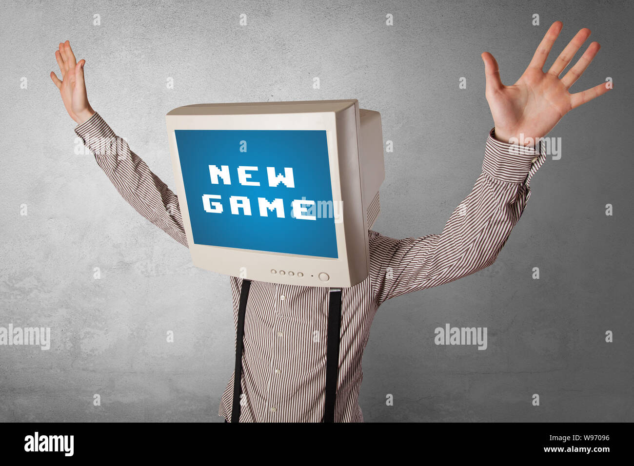 Young person with monitor head, gaming concept Stock Photo - Alamy