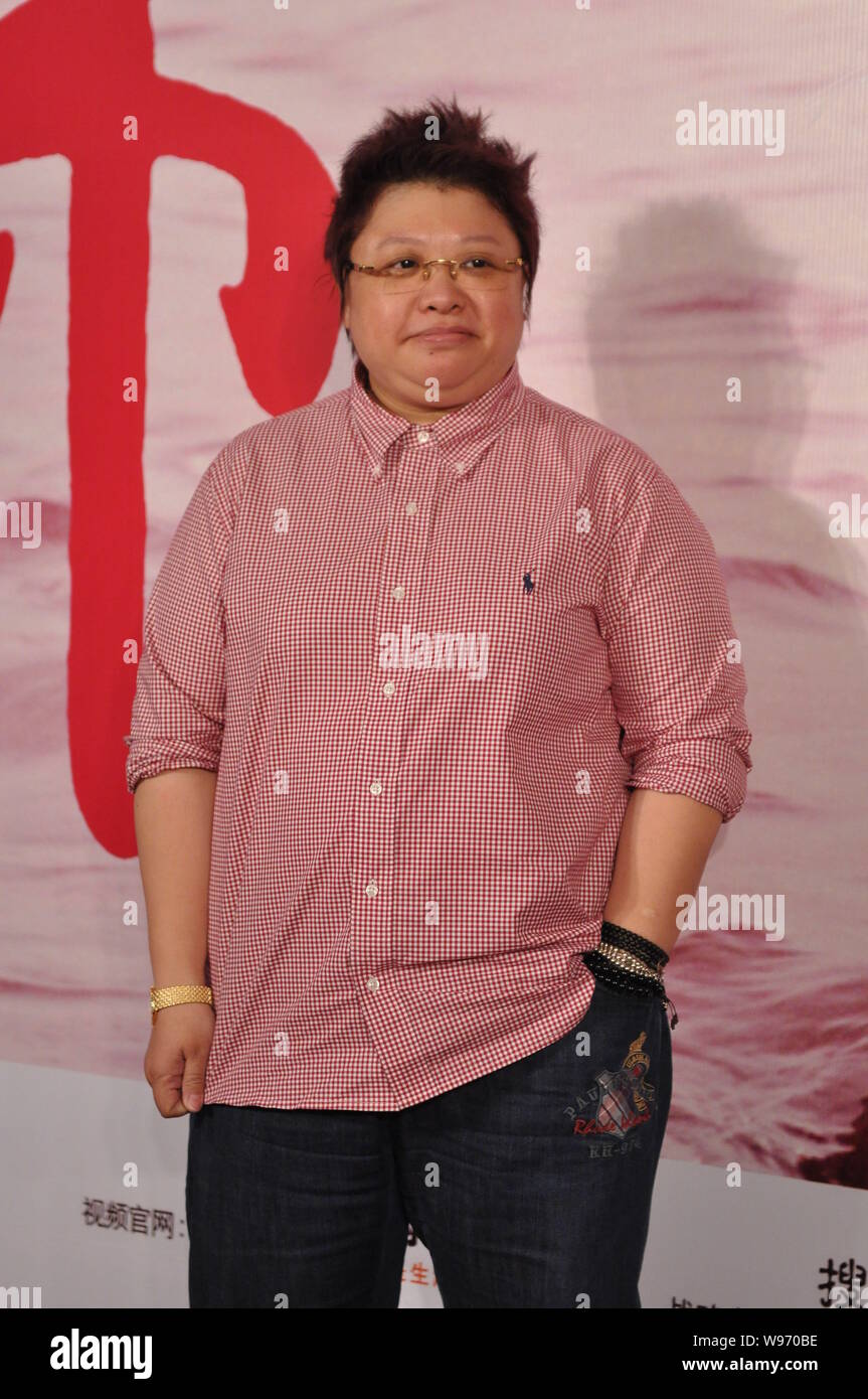Chinese singer Han Hong poses on the red carpet during the premiere ...