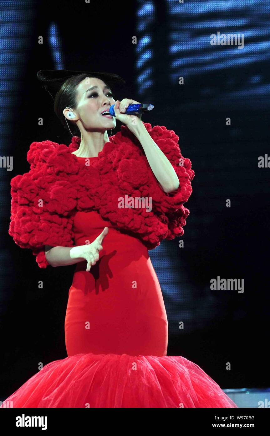 Taiwanese singer Fan Fan performs during her concert in Guangzhou ...