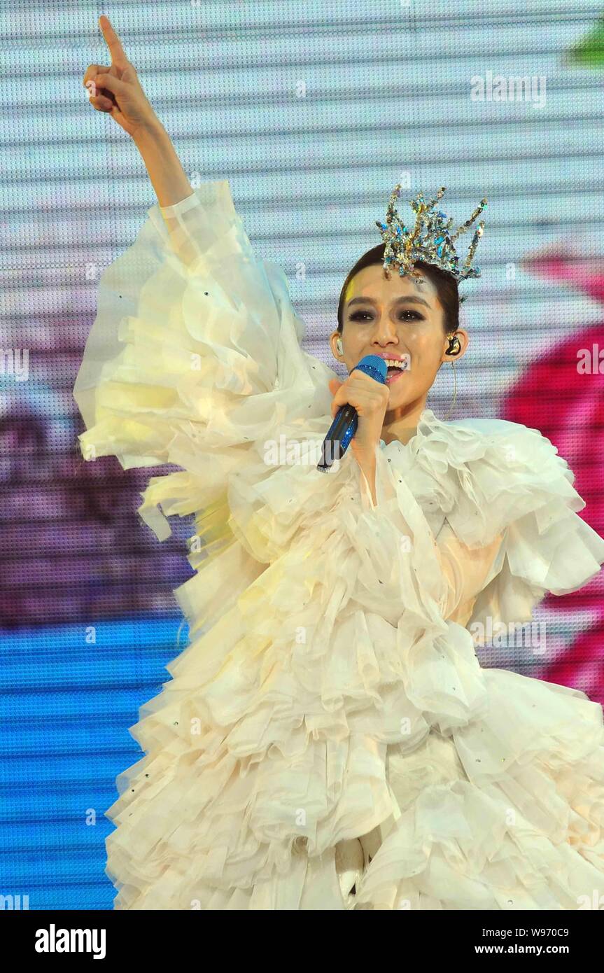 Taiwanese singer Fan Fan performs during her concert in Guangzhou ...