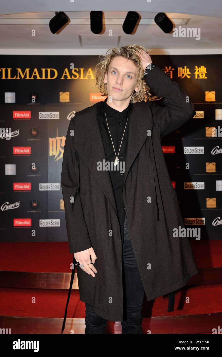 English actor Jamie Campbell Bower poses during a charity premiere of ...