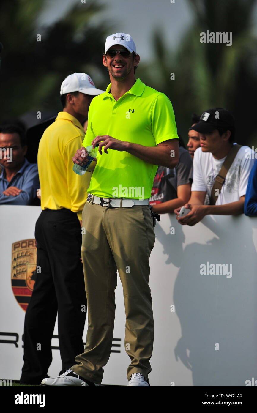 US Olympic swimming champion Michael Phelps, front, looks on during the ...
