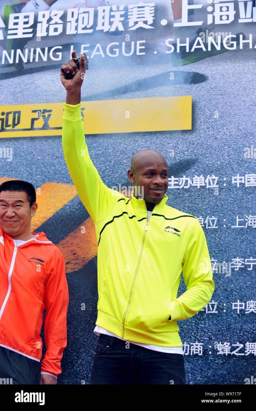 Jamaican sprinter Asafa Powell fires the starting gun for 2012 China ...