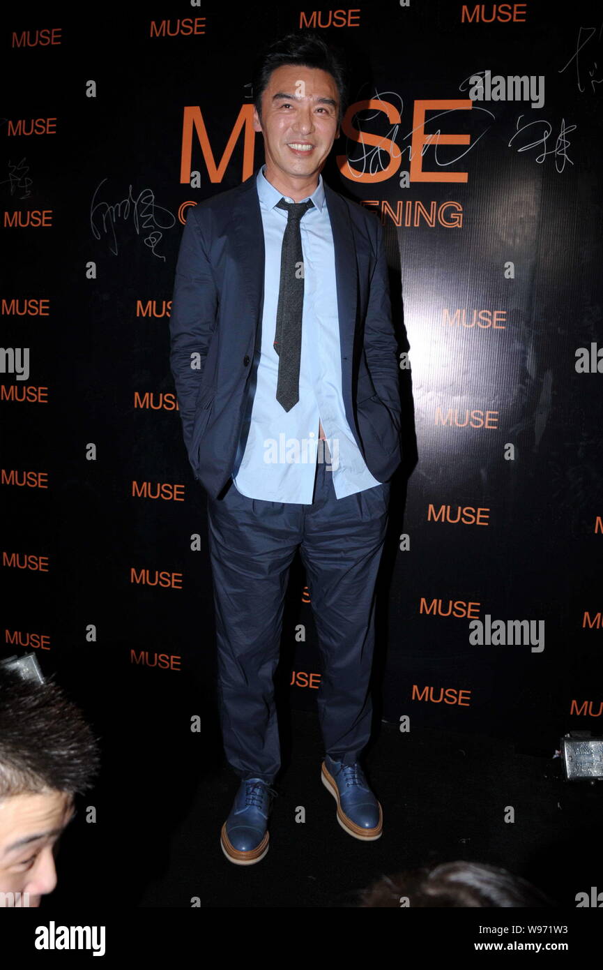 Hong Kong actor Kenny Bee poses during the opening party for Carina ...