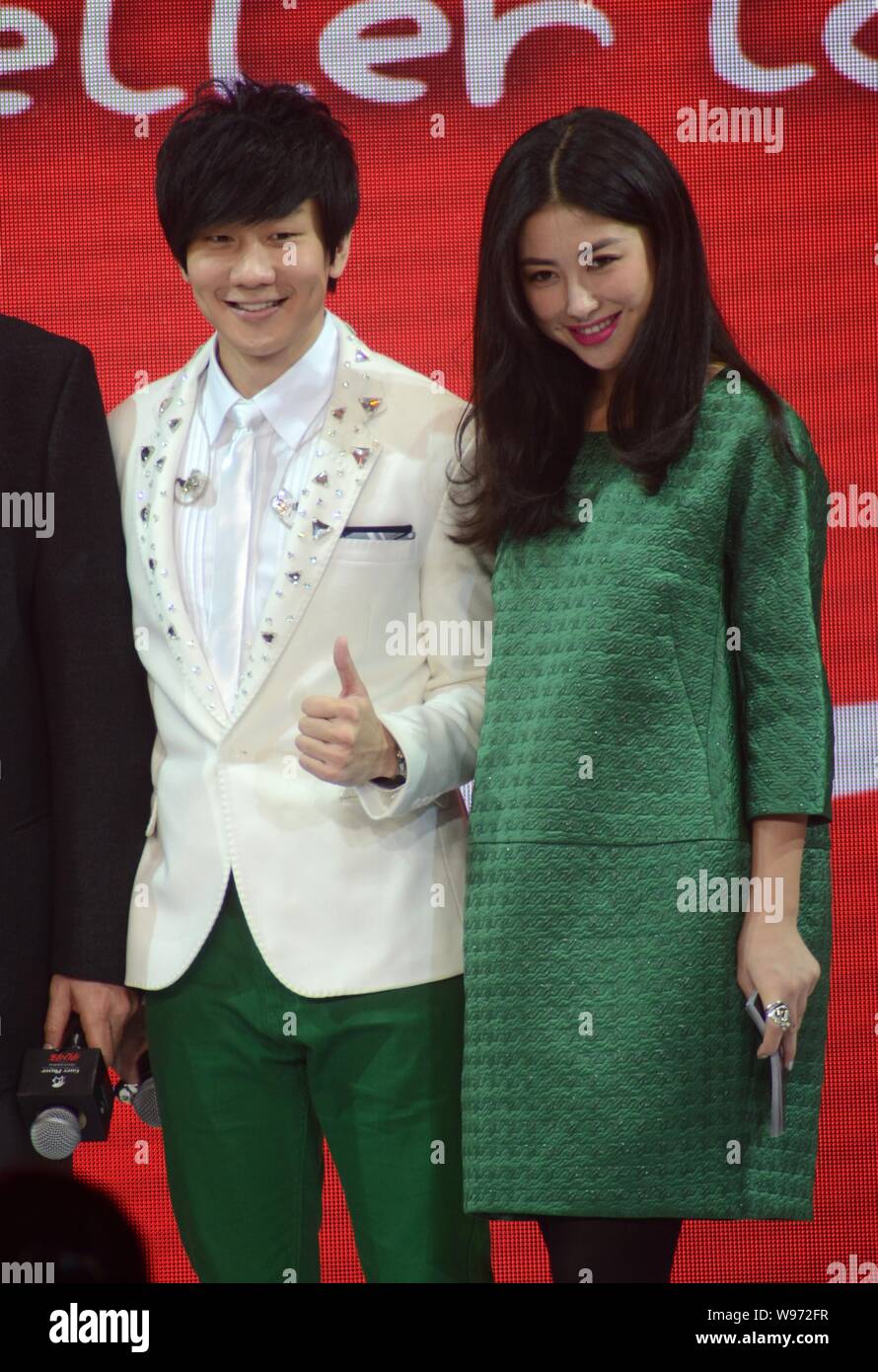 Singaporean singer JJ Lam, left, poses with Chinese actress Zhu Zhu, ex ...