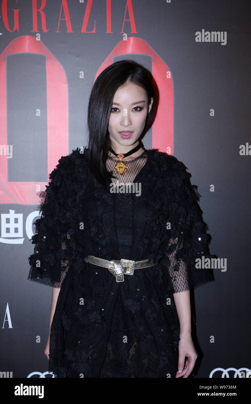 Chinese actress Ni Ni poses as she arrives for a party to celebrate the ...