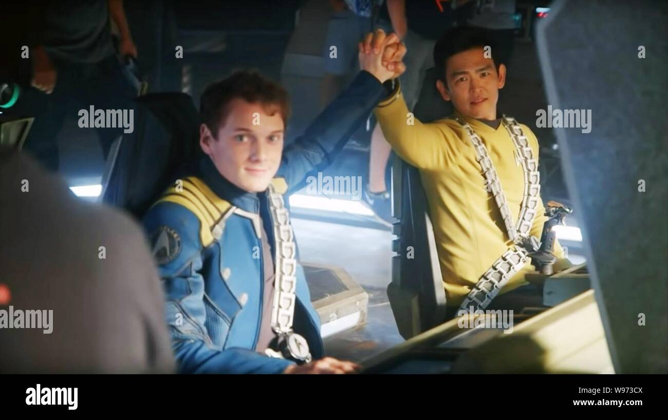 LOVE, ANTOSHA, from left: Anton Yelchin, John Cho on the set of STAR ...