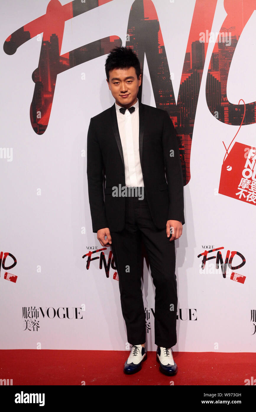 Chinese actor Tong Dawei poses on the red carpet as he arrives for the ...