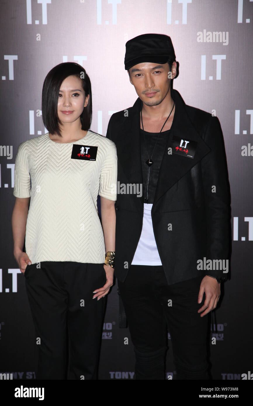 Chinese actress Liu Shishi, left, and actor Hu Ge pose as they arrive ...