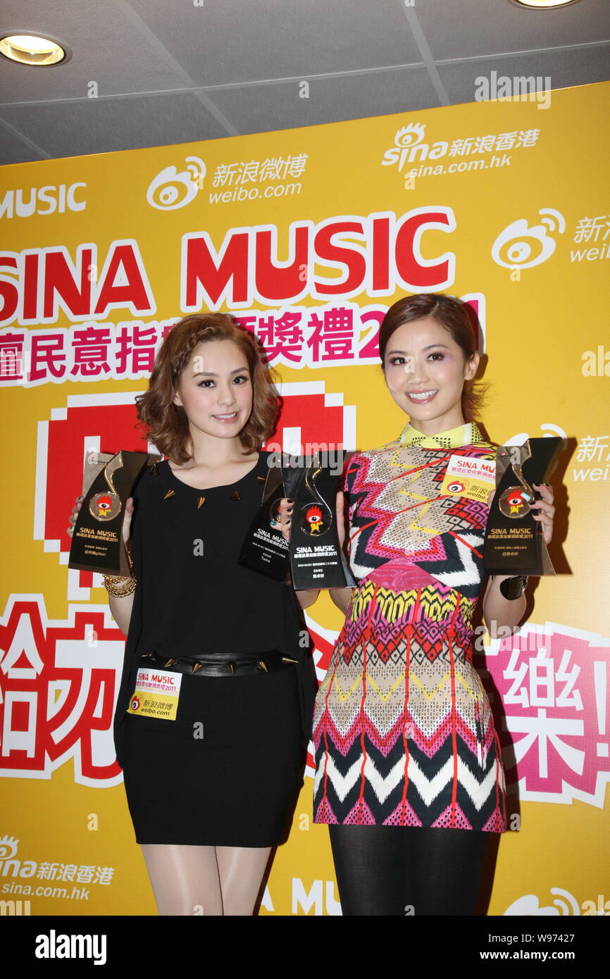 Hong Kong female duo Twins are pictured during an awarding ceremony ...