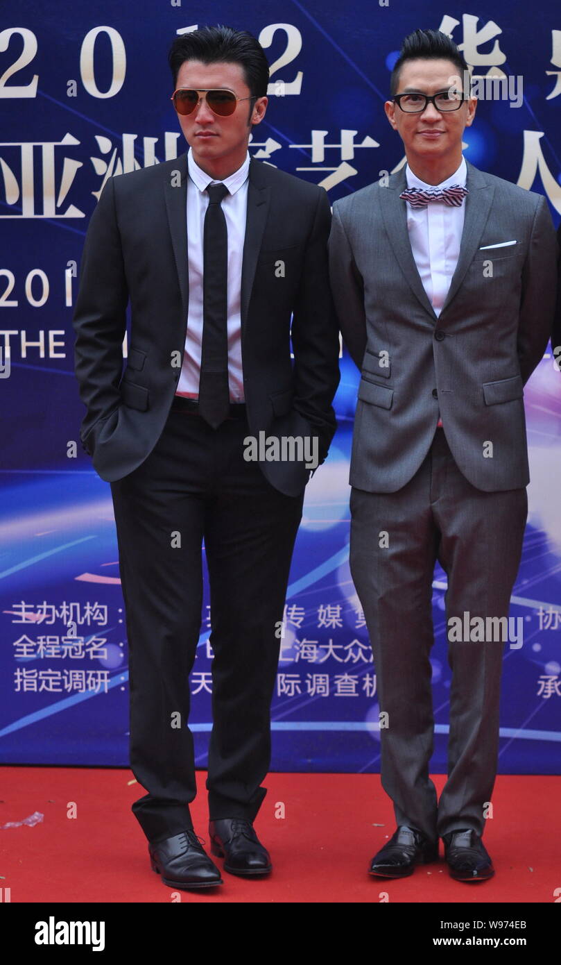 Hong Kong actor Nicholas Tse (L) and Nick Cheung pose on the red carpet ...