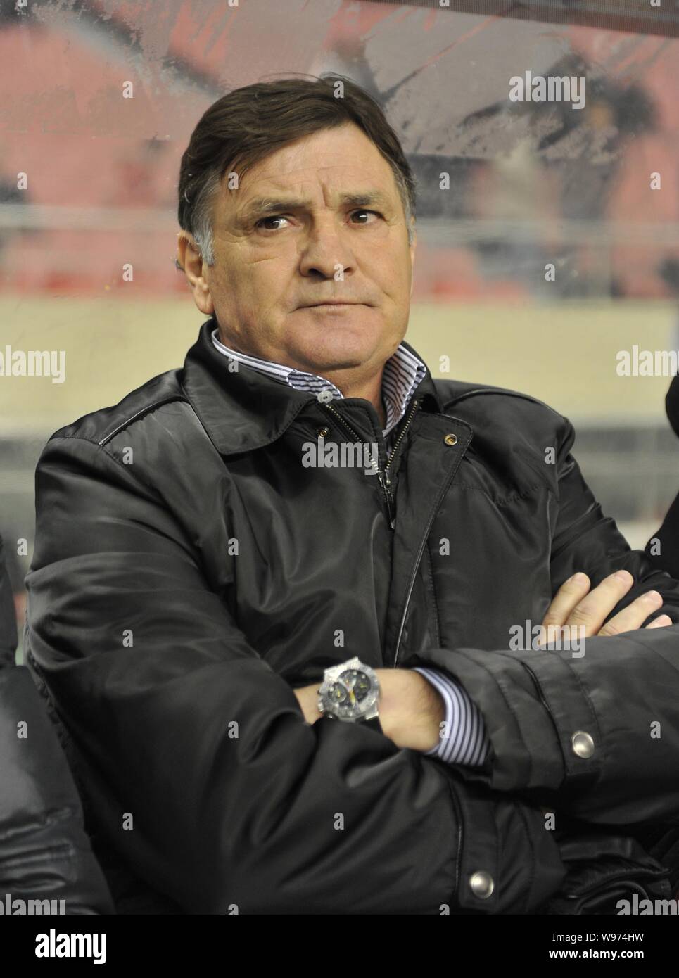 Head coach Jose Antonio Camacho Alfaro of China watches a football ...