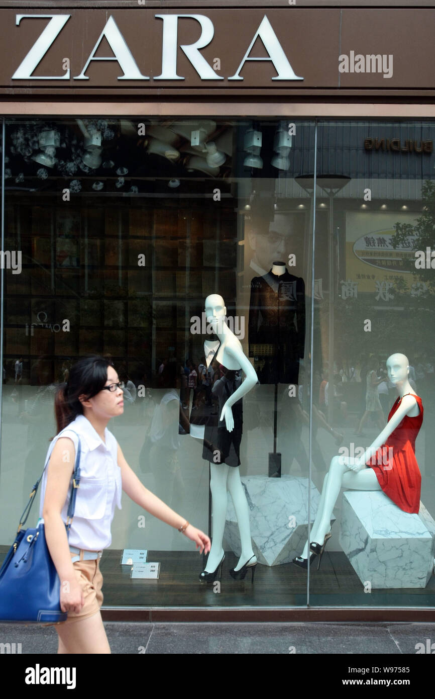--FILE--A pedestrian walks past a Zara store in Shanghai, China, 9 ...