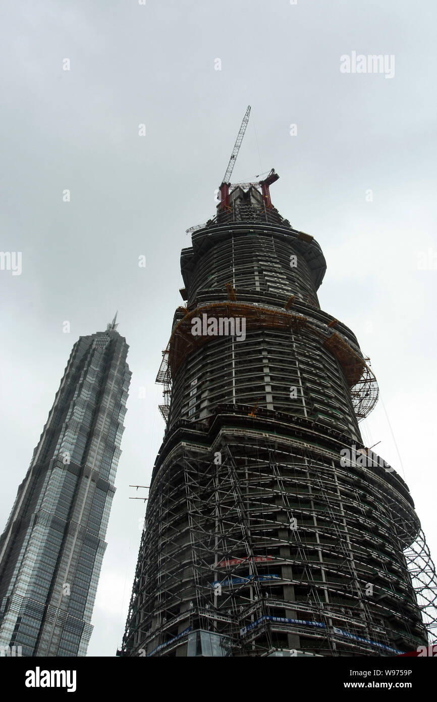 View of the Shanghai Tower (R) under construction in Shanghai, China, 2 ...