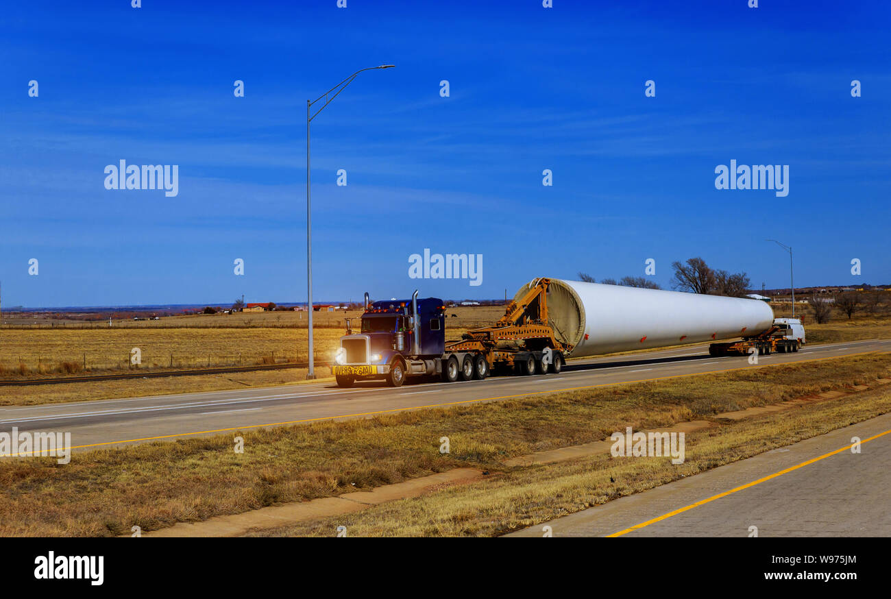 Transporting wing the farm wind turbines blade on trailer Stock Photo ...