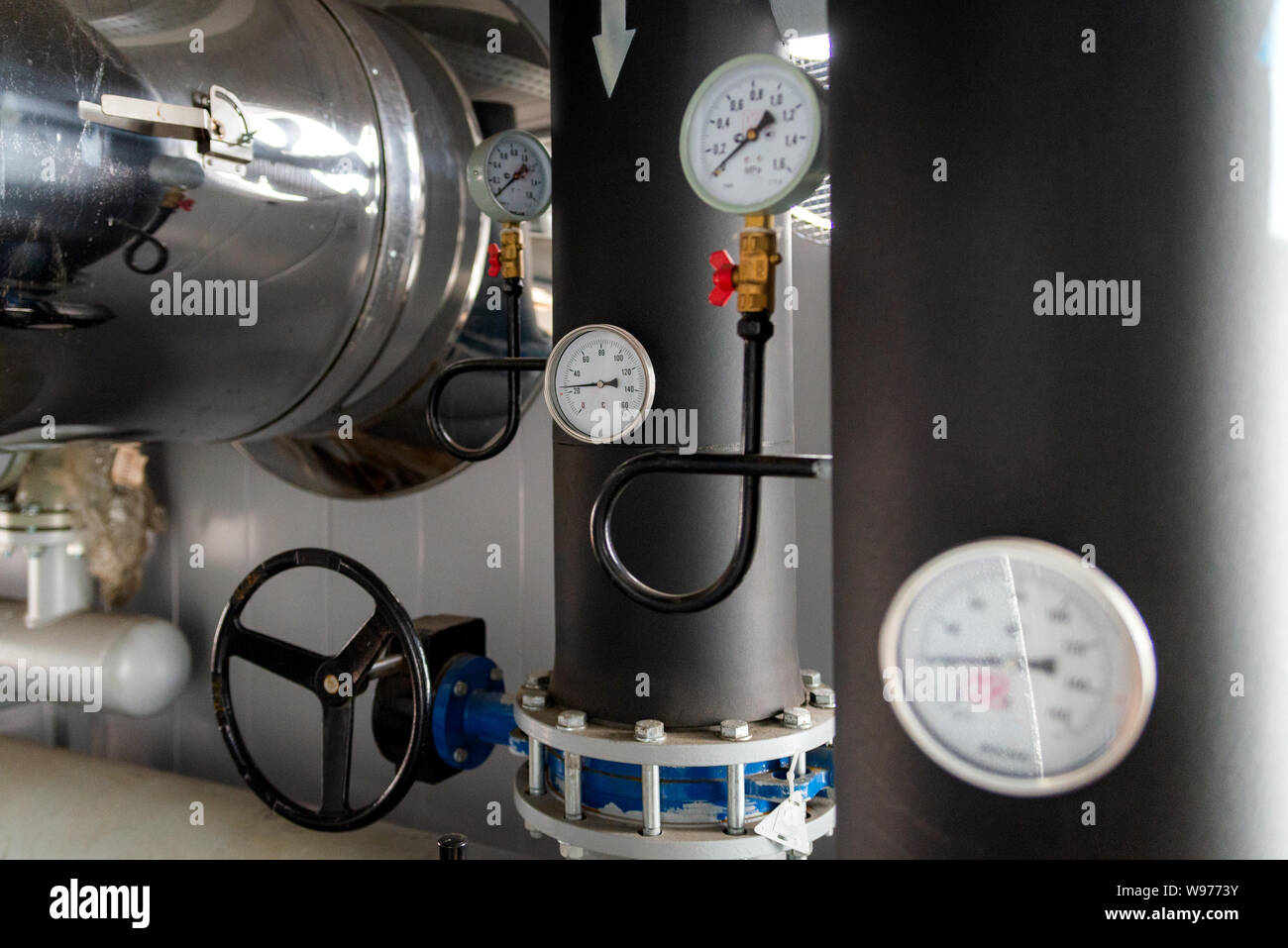 The equipment of the boiler-house, - valves, tubes, pressure gauges ...
