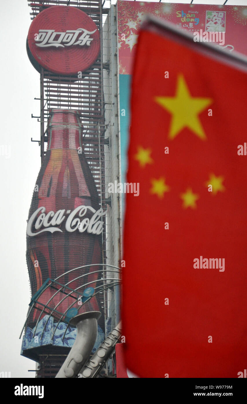 --FILE--A Chinese national flag is pictured in front of an ...