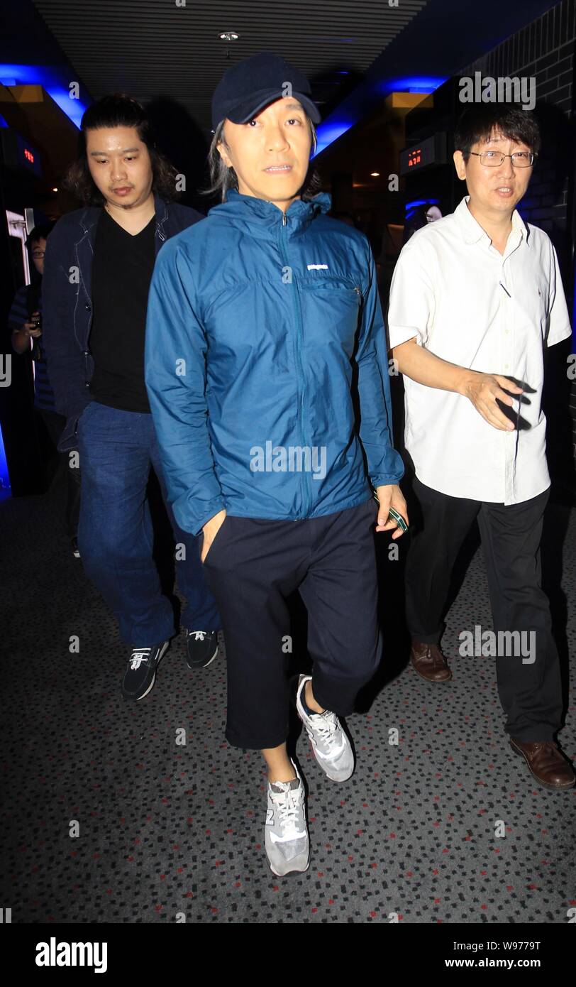 Hong Kong actor and director Stephen Chow (C) is pictured during a ...