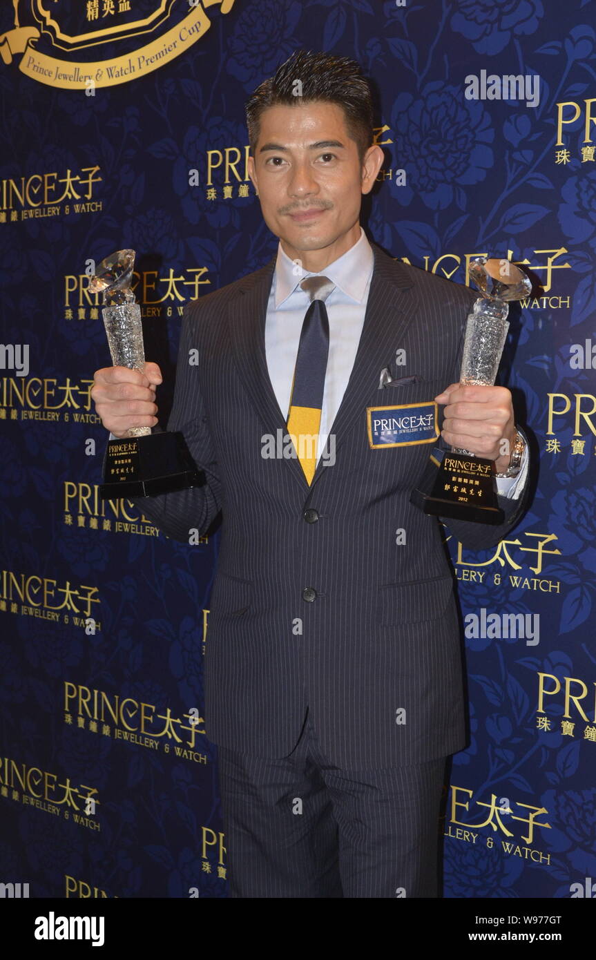 Hong Kong singer and actor Aaron Kwok poses at the press conference for ...