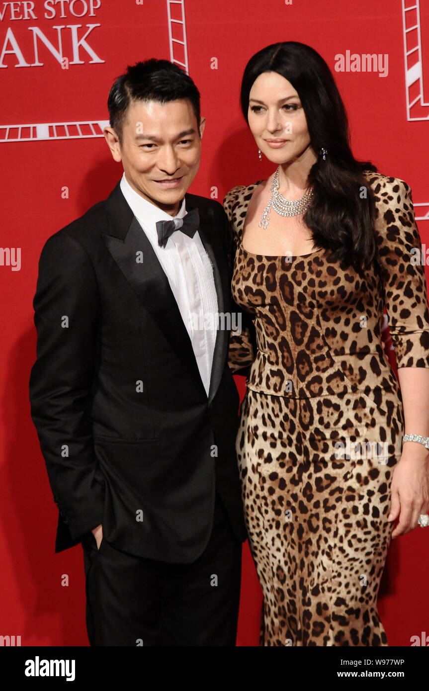 Italian actress Monica Bullucci poses with Hong Kong actor Andy Lau ...