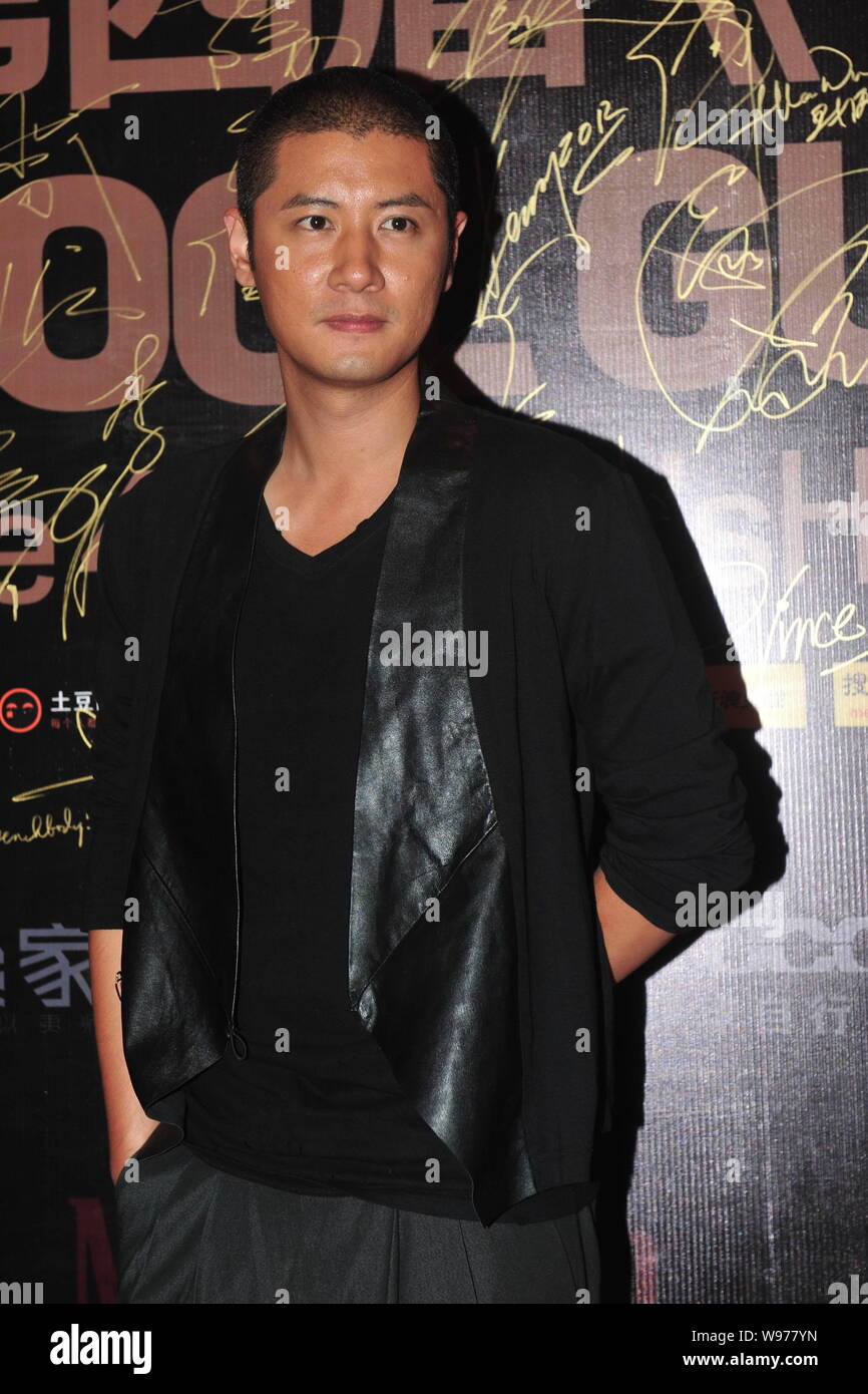 Chinese actor Ren Chong poses on the red carpet as he arrives for the final of the 4th Cool Guy ...