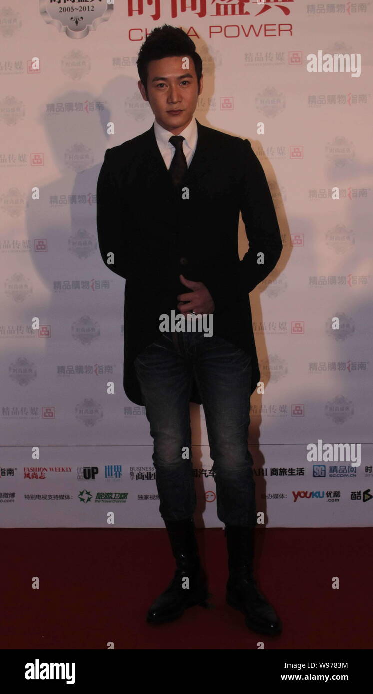 Chinese actor Lu Yi poses during a fashion awards ceremony in Beijing ...
