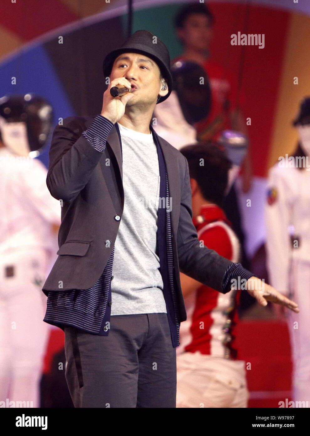 Hong Kong singer Jacky Cheung performs during a ceremony by Coca-Cola ...