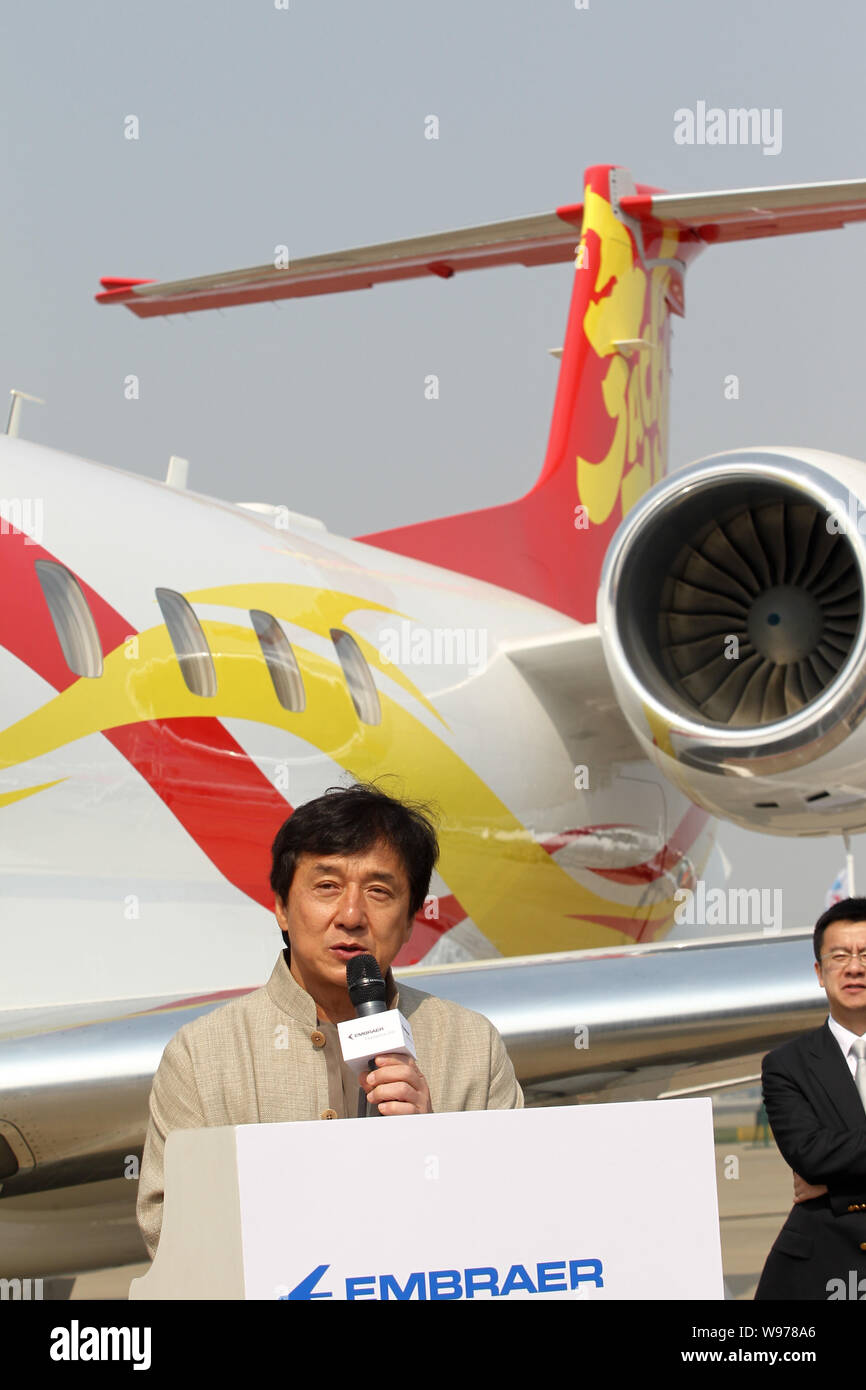 Hong Kong actor Jacky Chan speaks during a ribbon cutting ceremony for ...