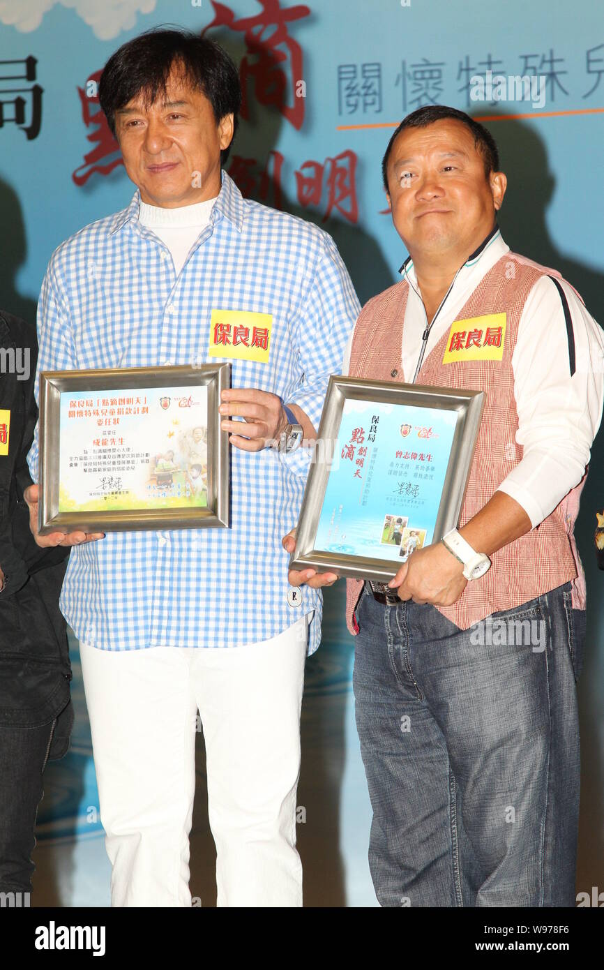 Hong Kong kungfu superstar Jackie Chan, left, poses with actor Eric ...