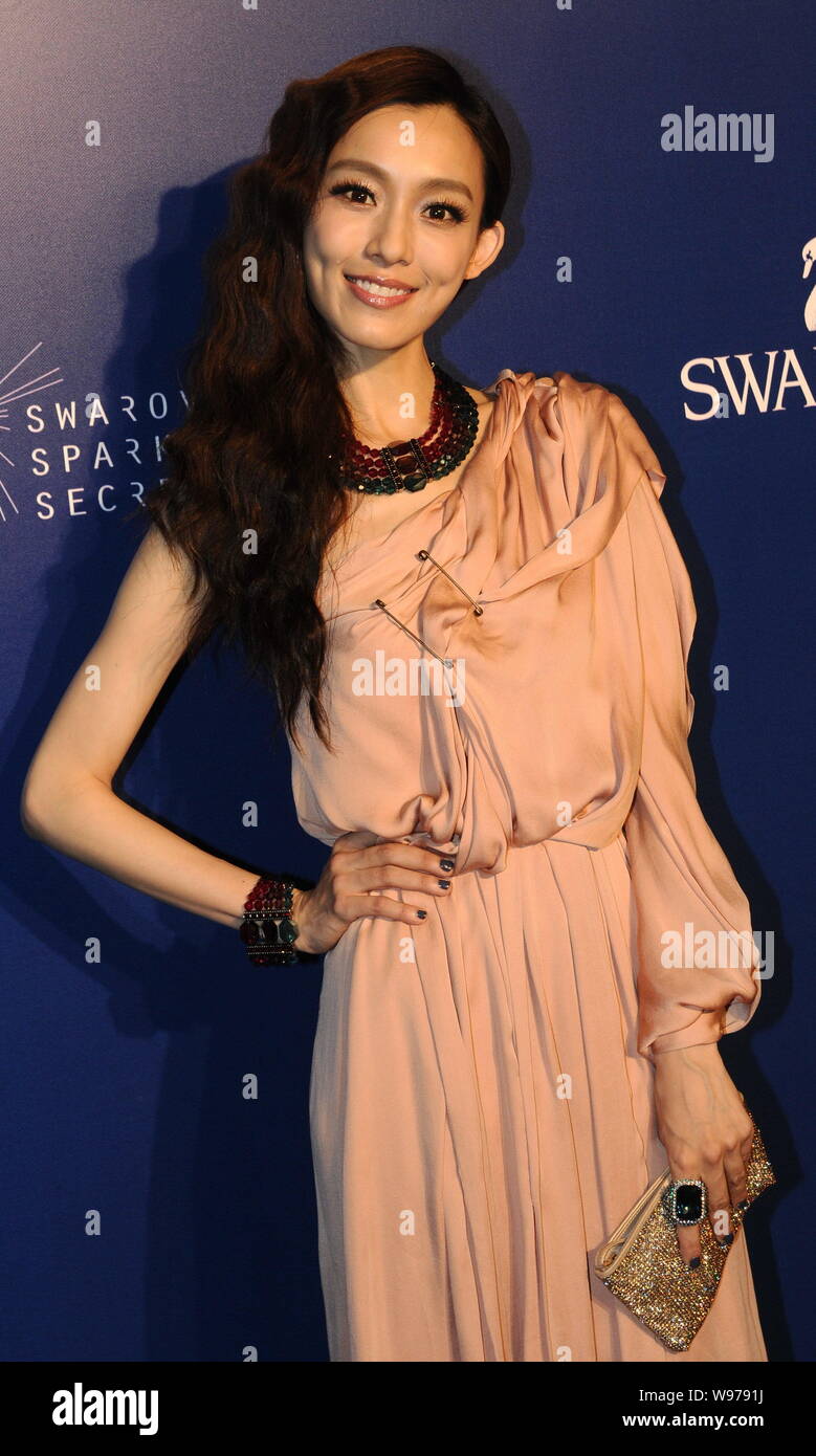 Taiwanese singer Fan Fan poses on the red carpet prior to the opening ...