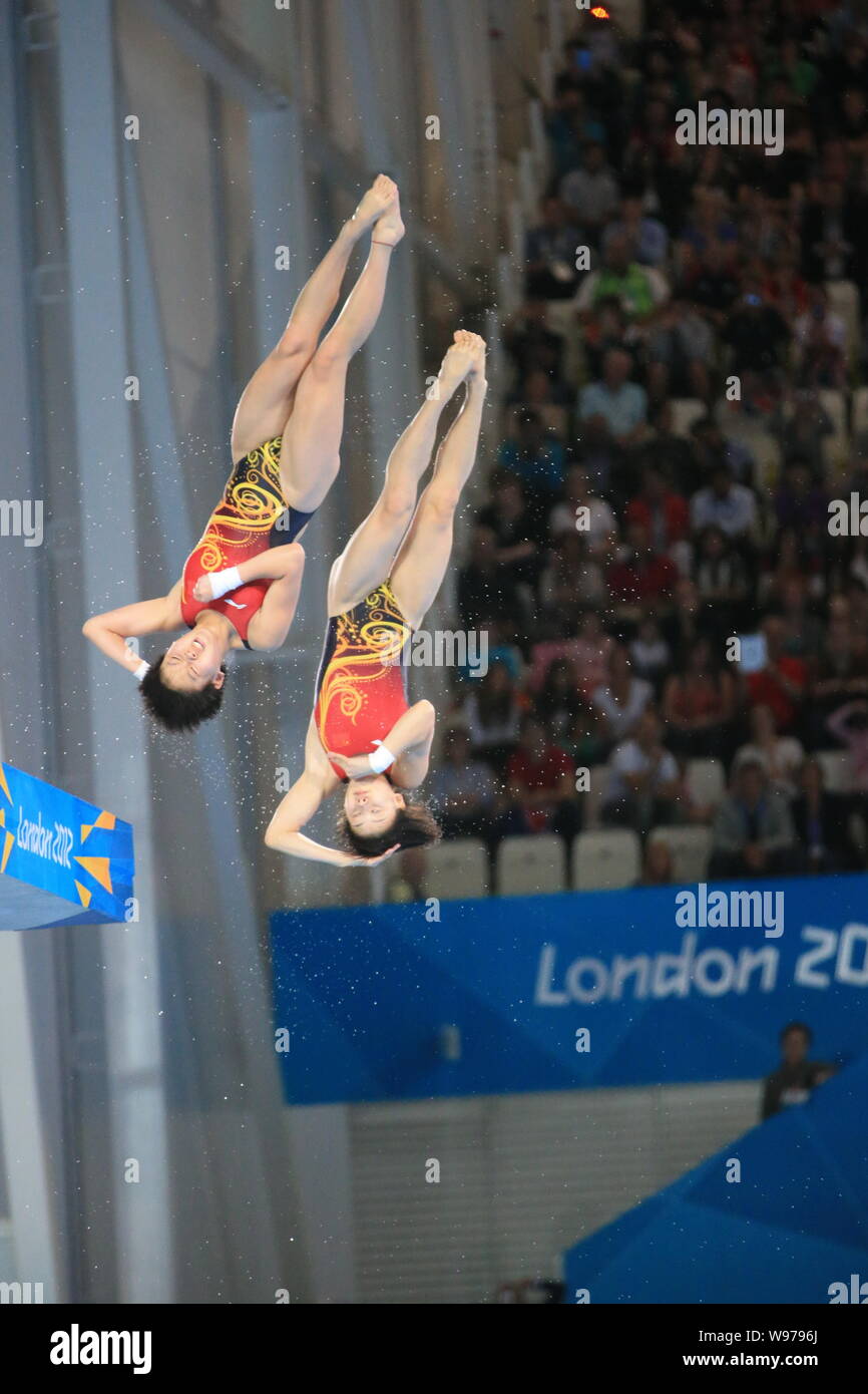 Chen Ruolin, left, and Wang Hao of China compete in the final of the ...