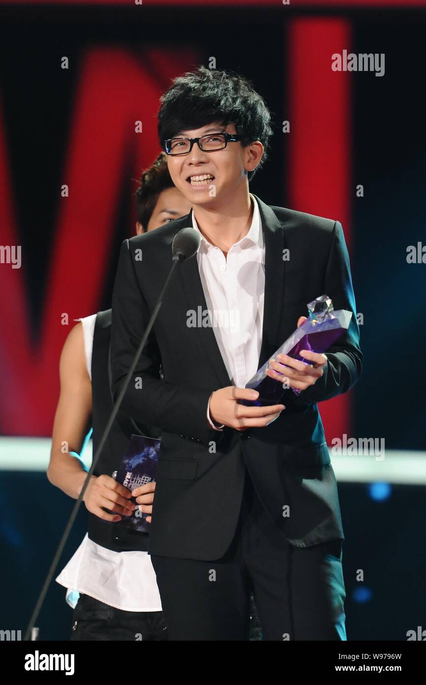 Chinese singer Hu Xia speaks after being awarded the trophy for the ...